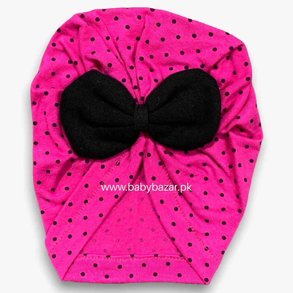 New Born Baby Cap In Pink Color With Bow In Black Color – Baby Bazar